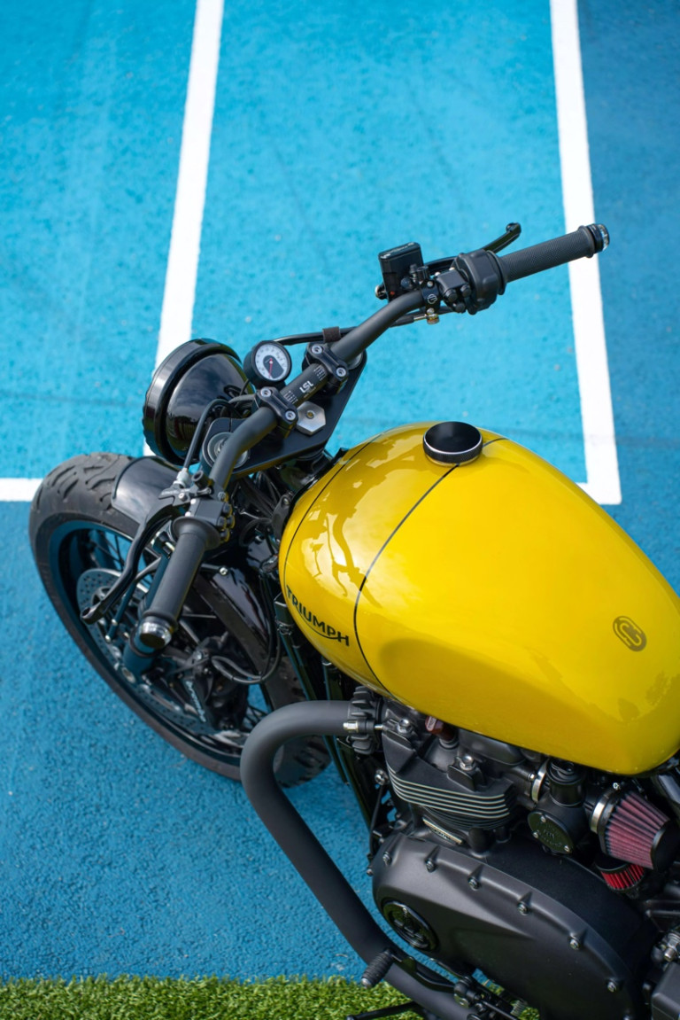 Functional Muscle: “Yellow Edition” Triumph 1200 Bobber – BikeBound
